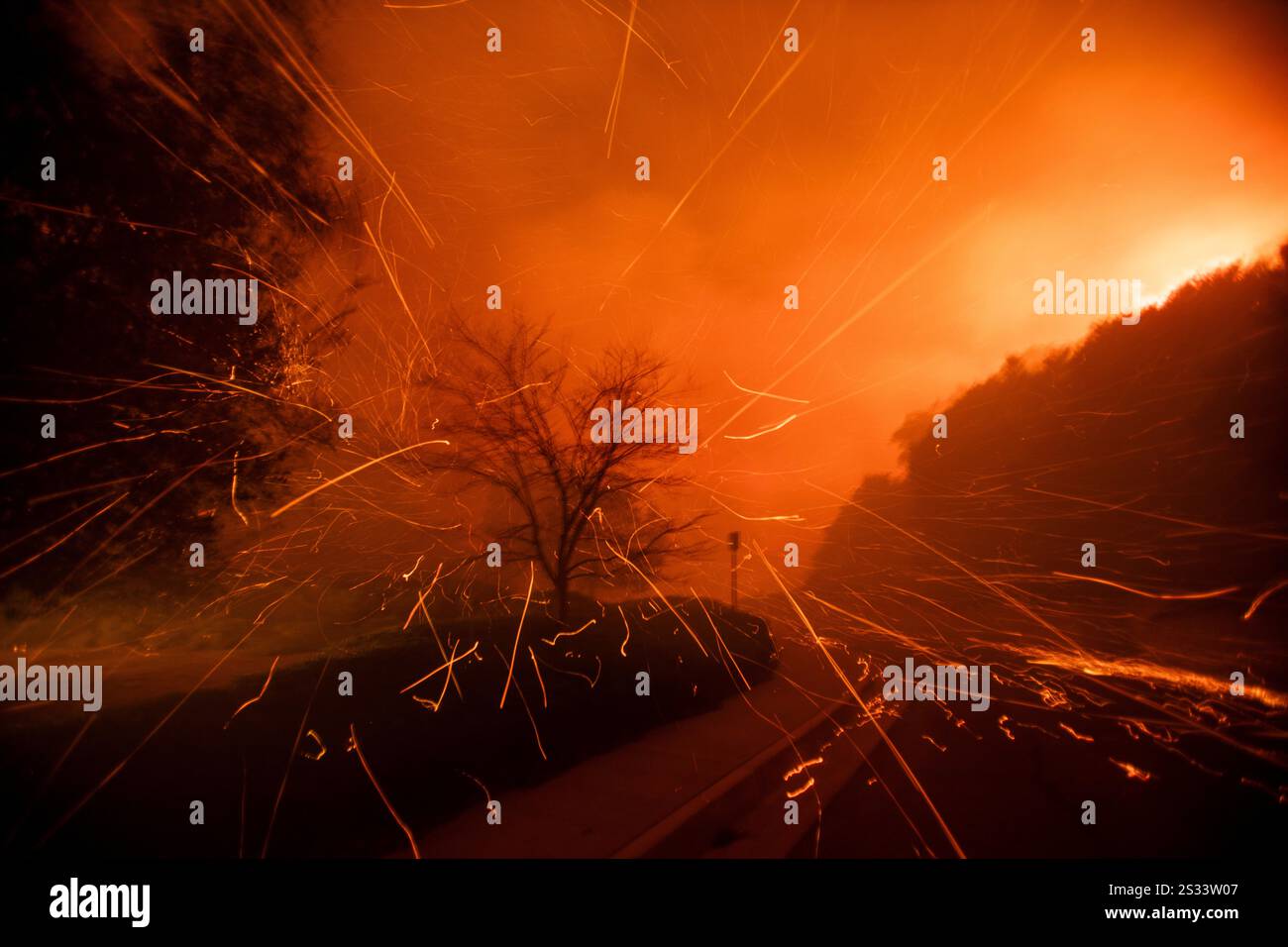 Altadena, California, USA. 8th Jan, 2025. The wind whips embers as the ...