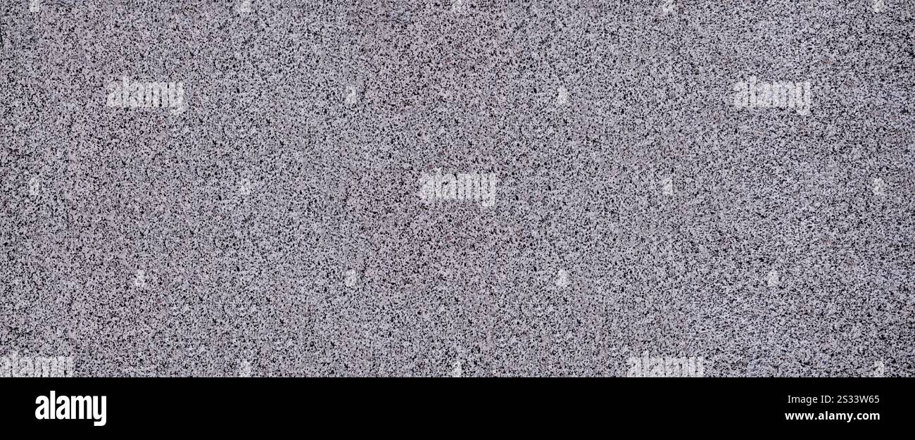 The texture of solid granite tiles. Hard and slippery gray granite ...