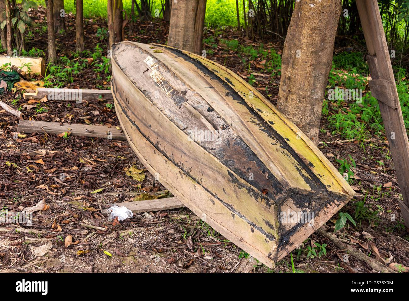 Wooden conoe waiting to be used. San Antonio del Cacao Island, Amazonas ...