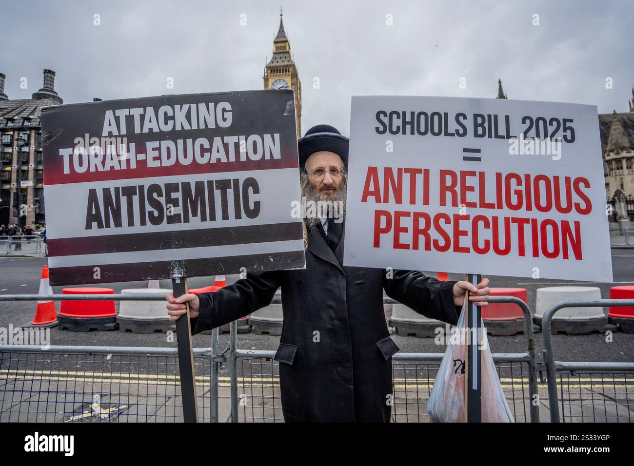 London, UK. 08th Jan, 2025. Orthodox Jewish Elder with placards ...