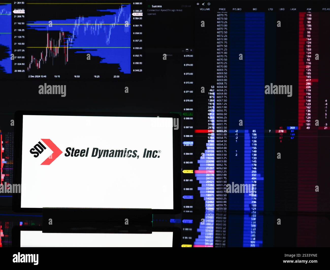 In this photo illustration, Steel Dynamics, Inc. logo seen displayed on a monitor Stock Photo ...