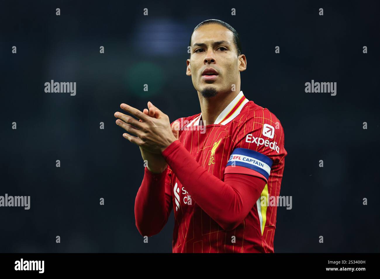 Virgil van Dijk of Liverpool applauds the fans ahead of the Carabao Cup ...