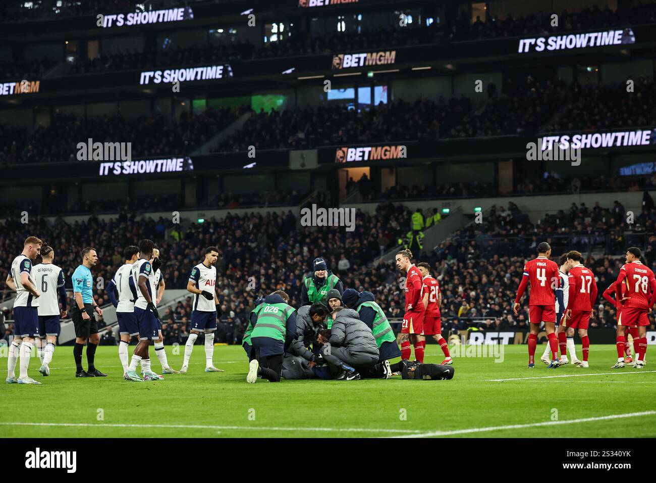 Rodrigo Bentancur of Tottenham Hotspur receives treatment during the Carabao Cup Semi-Finals ...