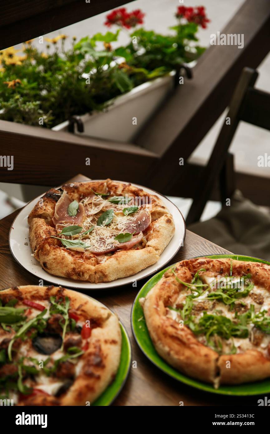 Delicious assortment of pizzas with various toppings, perfect for ...