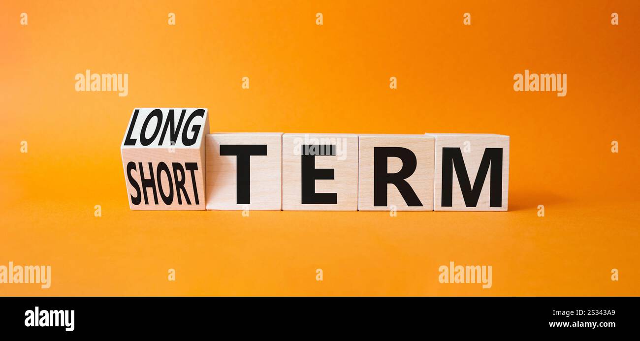 Long term vs Short Term symbol. Turned wooden cubes with words Long ...