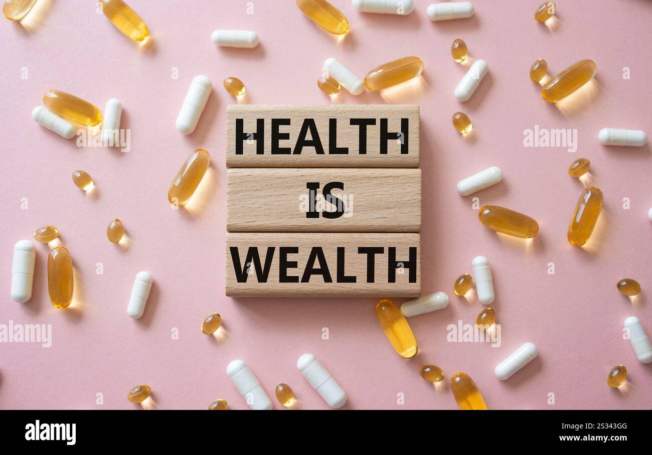 Health is Wealth symbol. Concept word Health is Wealth on wooden blocks ...