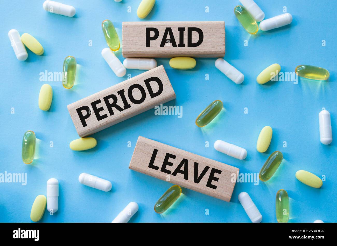 Paid Period Leave symbol. Concept words Paid Period Leave on wooden ...