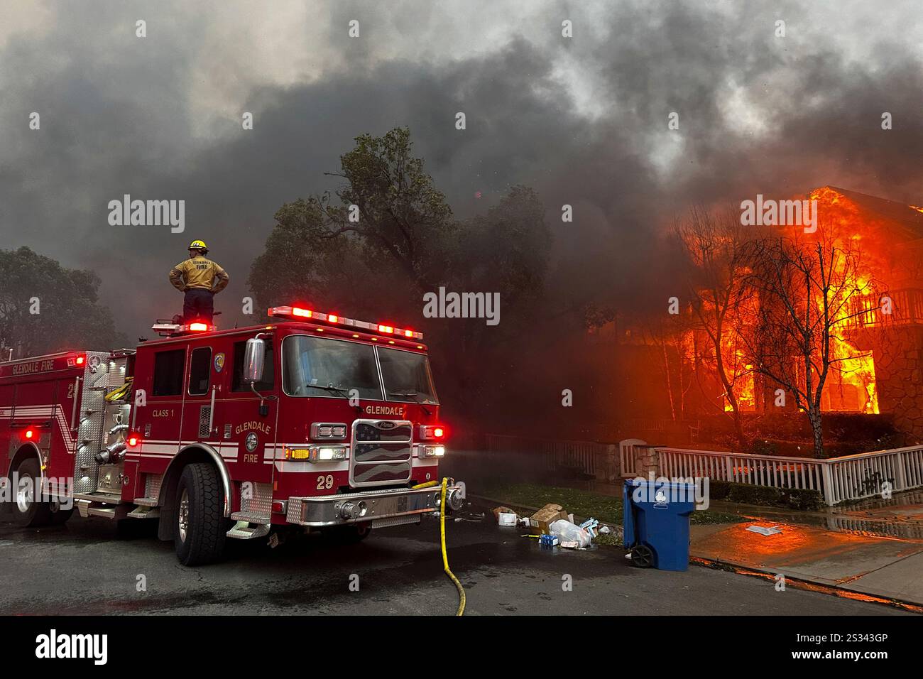 Firefighters battle the Palisades Fire as it burns structures in the ...