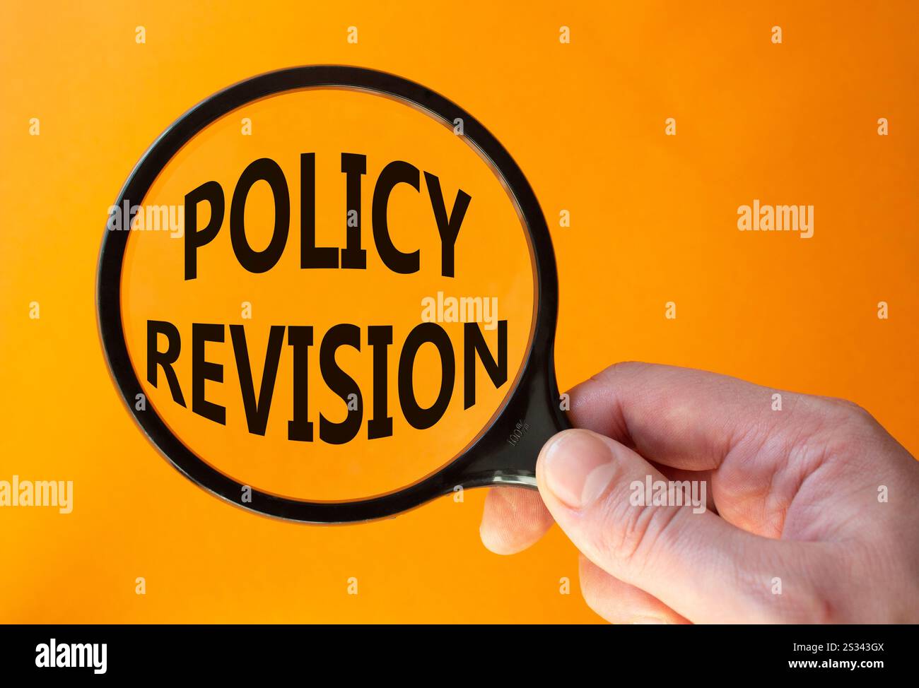 Policy revision symbol. Concept word Policy revision on magnifying ...
