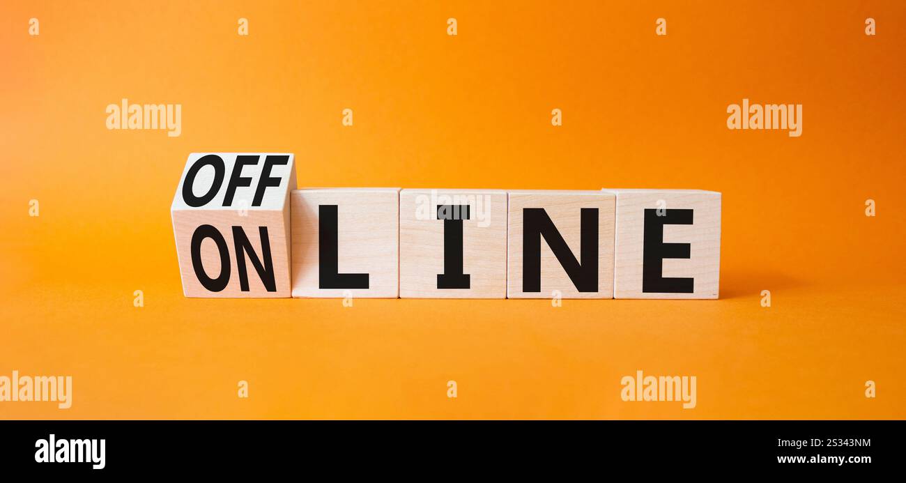 Offline and online symbol. Tturned wooden cubes with words Online and ...