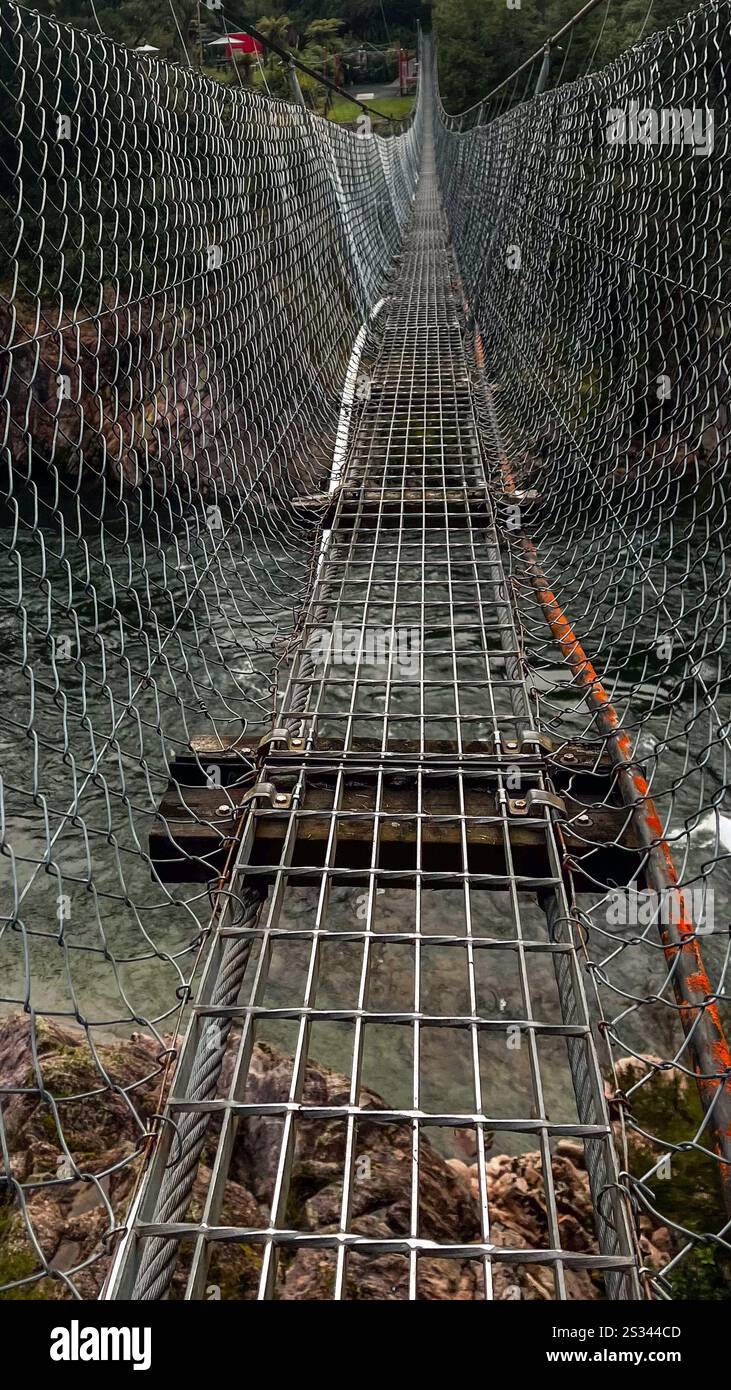 The Buller river flowing through the forest covered upper Buller Gorge ...
