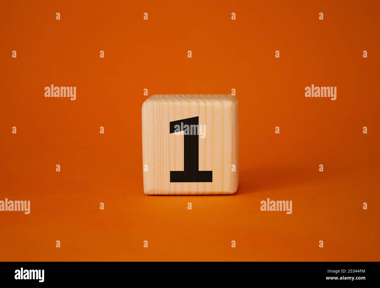 Number one symbol. Number 1 on wooden cubes. Beautiful orange ...