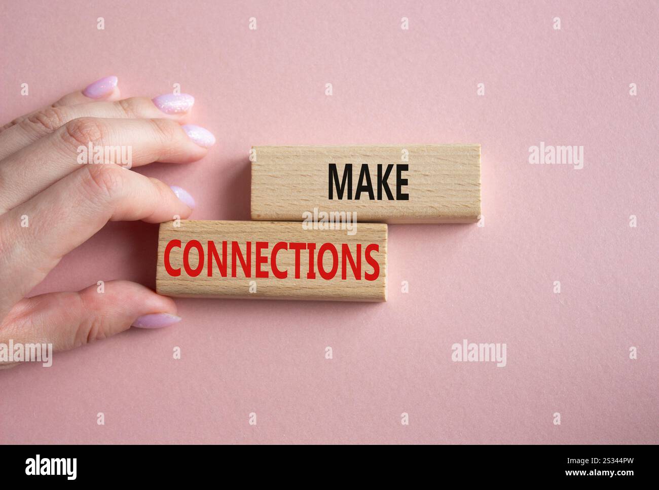 Make Connections symbol. Concept word Make Connections on wooden blocks ...