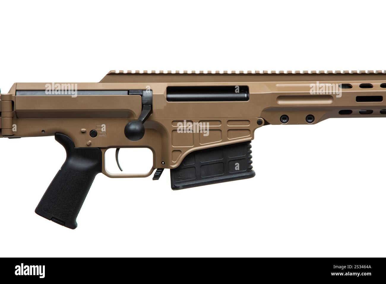 Close-up view of a tan-colored bolt-action rifle with a black grip and ...