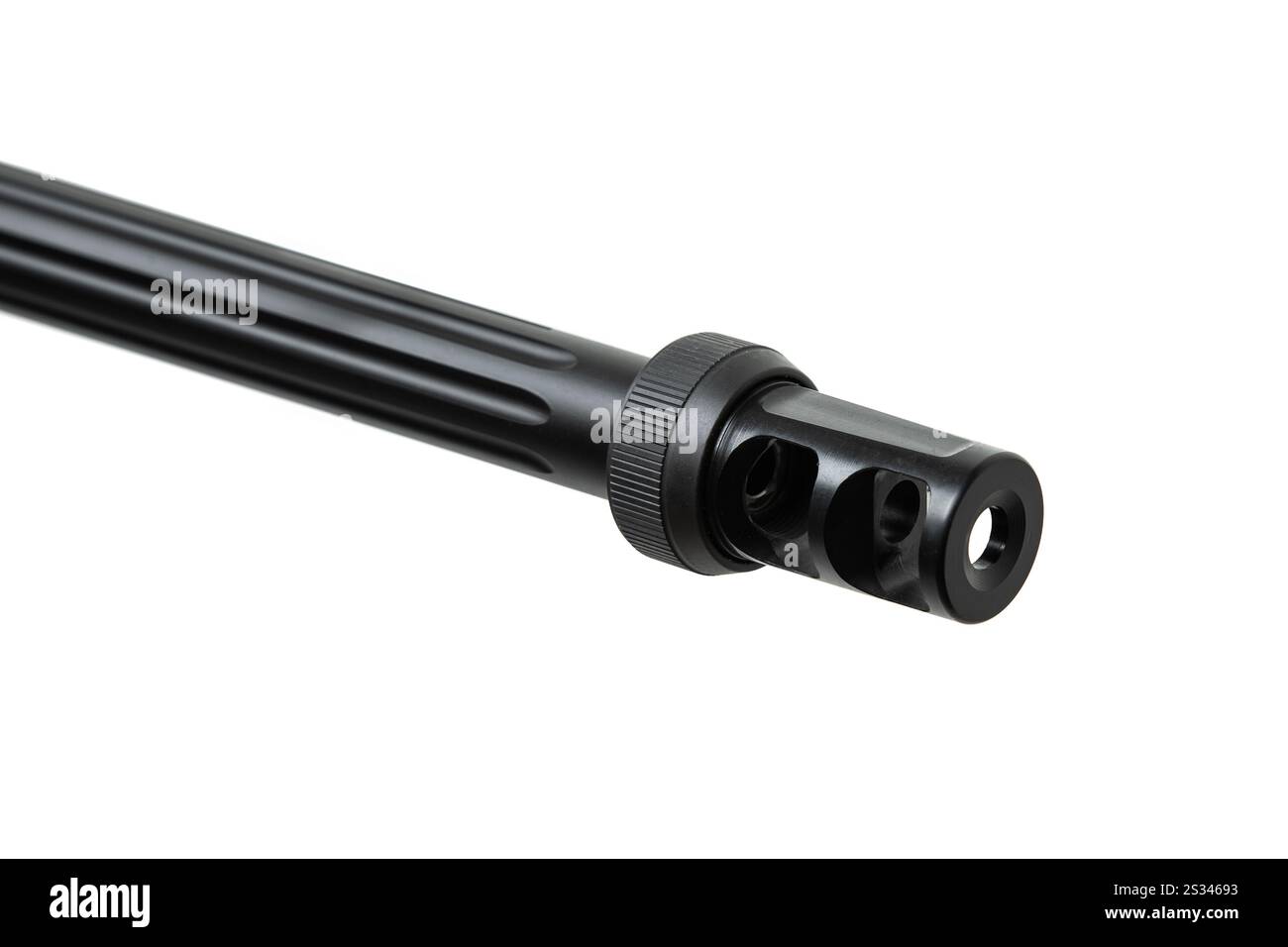 A black fluted rifle barrel with a muzzle brake, isolated on a white ...