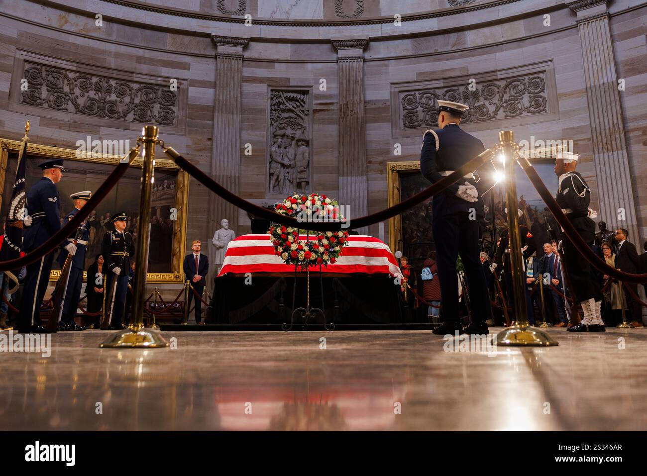 Members of the public pay their respects to the late President Jimmy ...