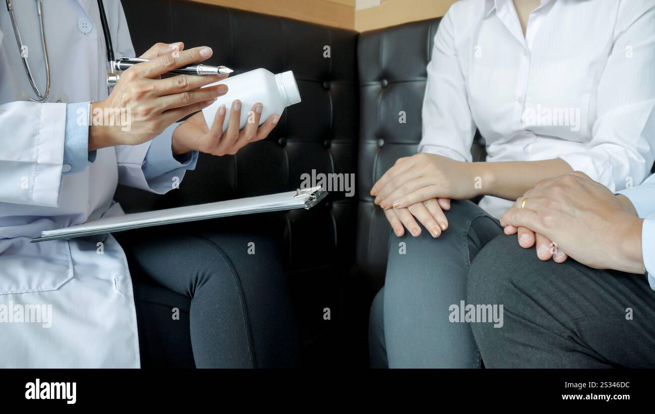 Health care Doctor giving medicine to patient for arthritis pain Stock ...