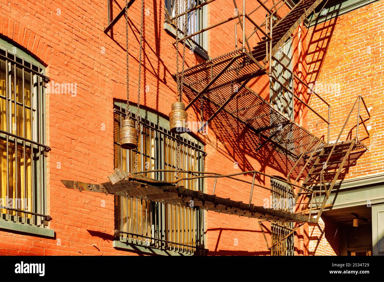 Fire escapes with weights on the facade of the Central Market in ...