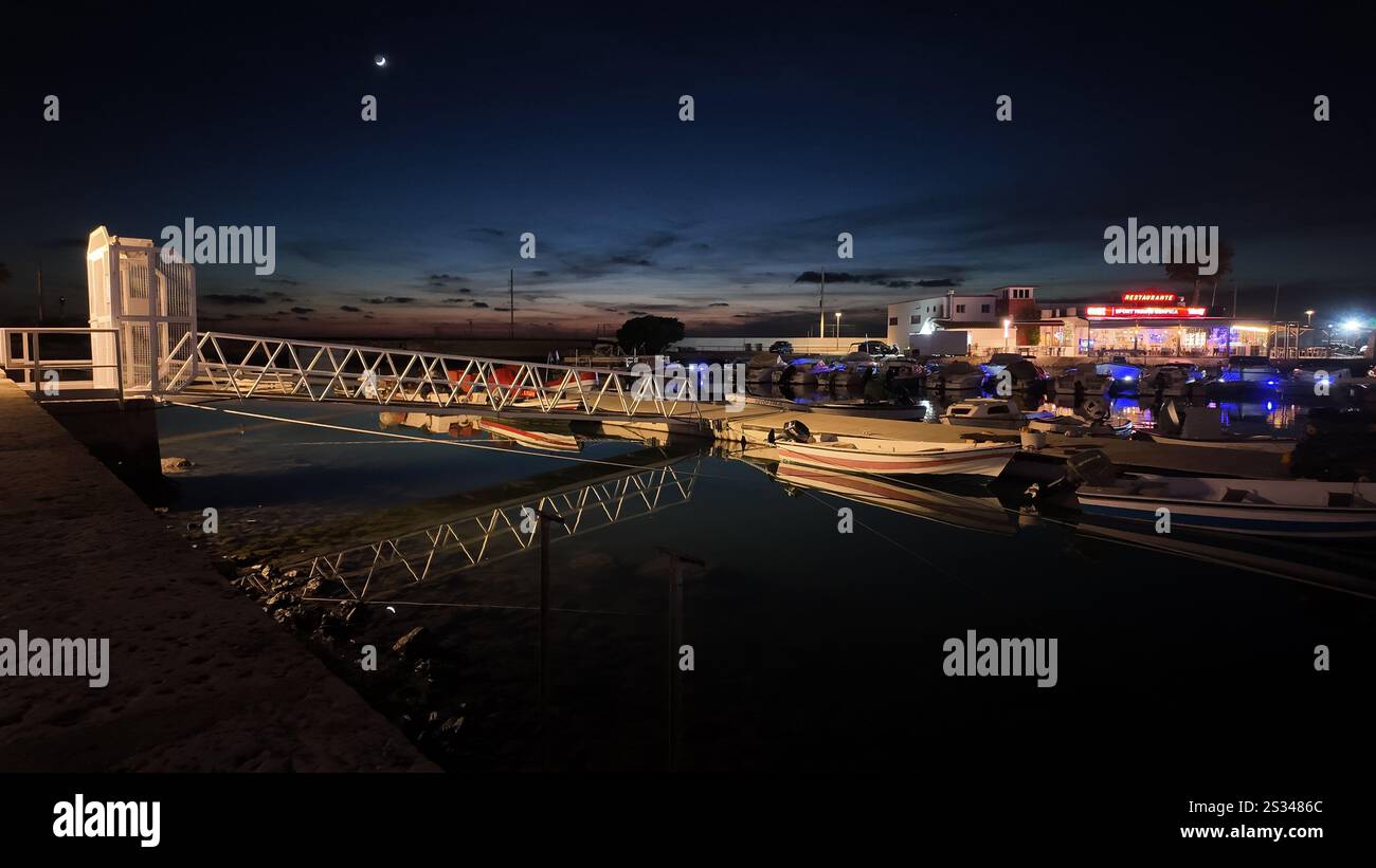 faro marina, also known as doca de faro, beautifully illuminated at ...
