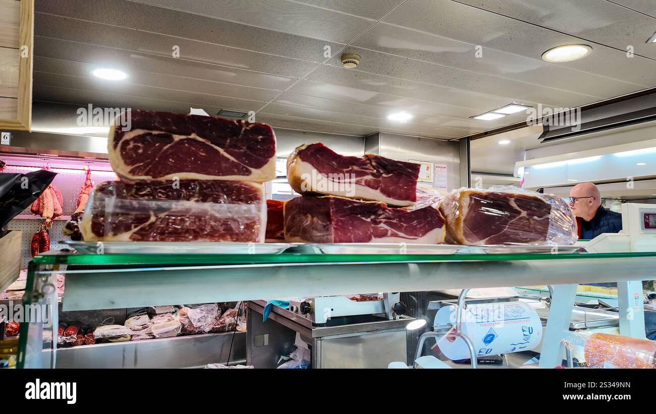 Local residents browse fresh produce inside the Faro Municipal Market ...