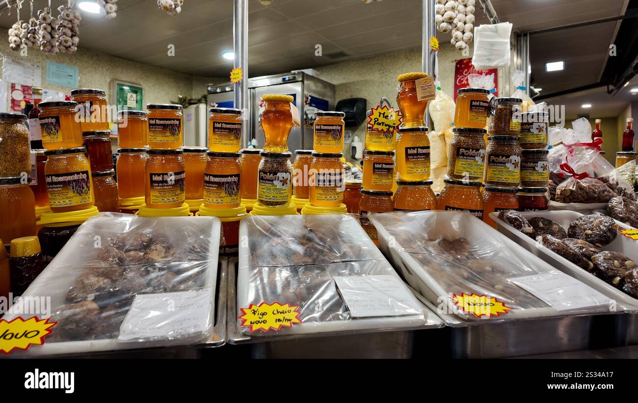 Local residents browse fresh produce inside the Faro Municipal Market ...