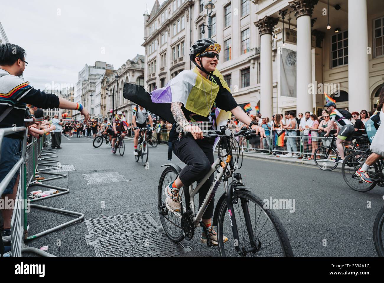 Cyclists Celebrating at the Pride of London Parade 2024 Stock Photo - Alamy