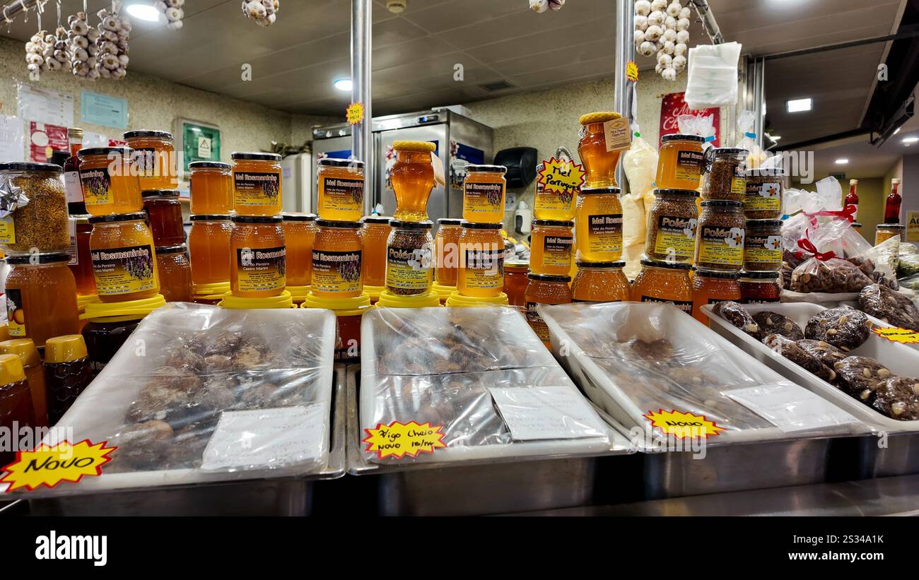 Local residents browse fresh produce inside the Faro Municipal Market ...