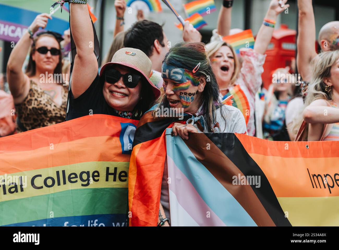 Diverse Group At Colourful Parade Celebrating Pride With Flags and ...