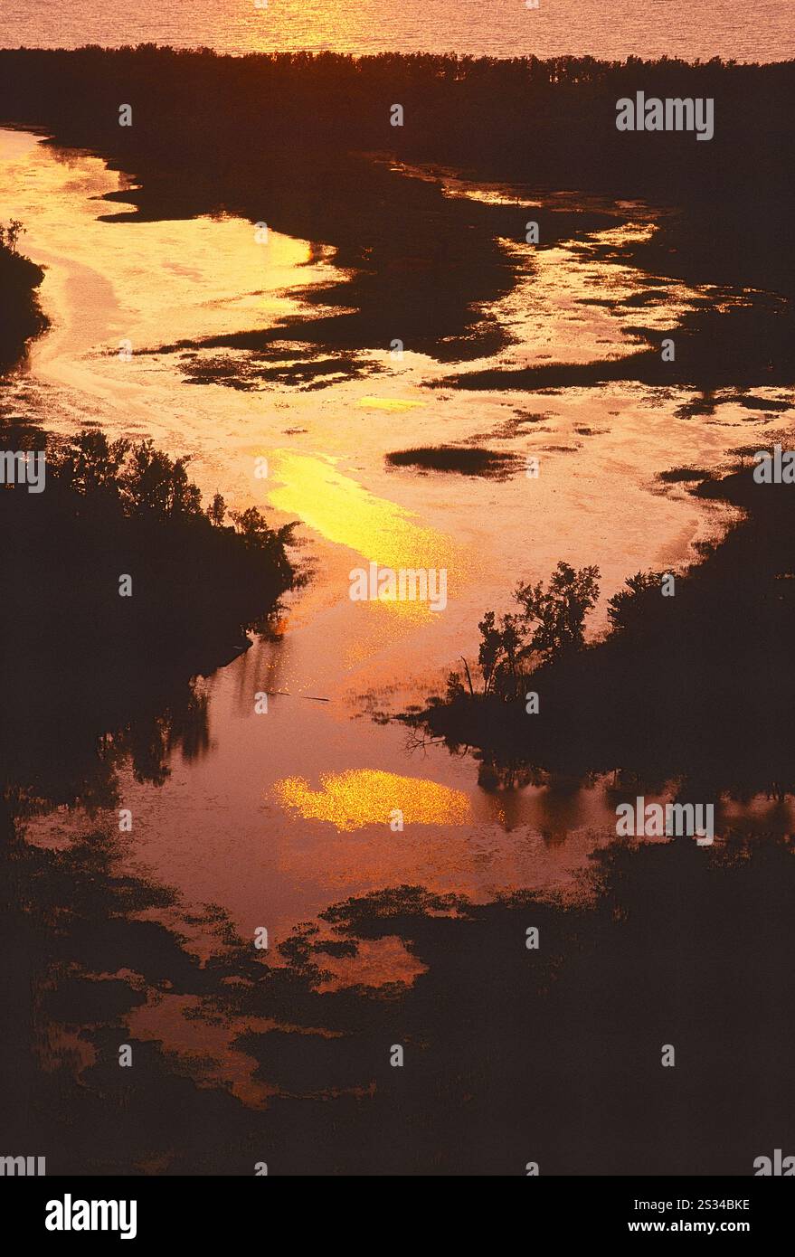 Aerial view of sunset over Presque Isle State Park and Lake Erie ...