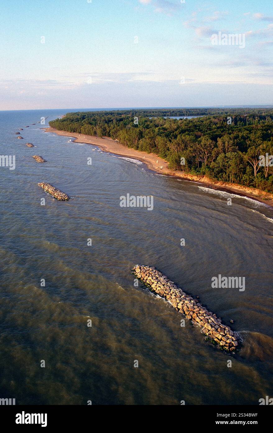 Aerial view of sunset over Presque Isle State Park and Lake Erie ...