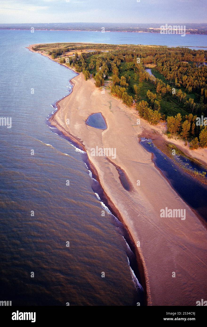 Aerial view of sunset over Presque Isle State Park and Lake Erie ...