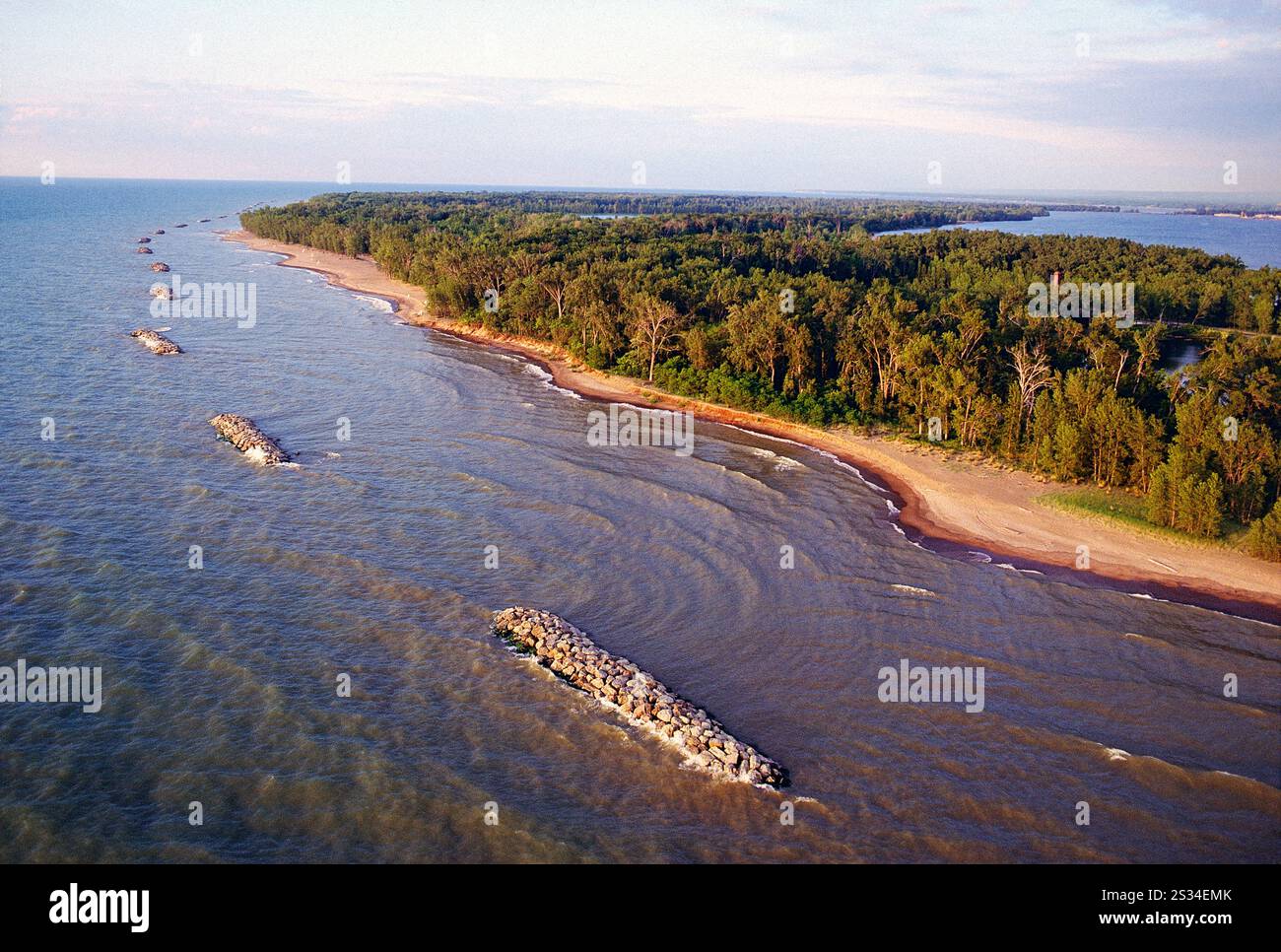 Aerial view of sunset over Presque Isle State Park and Lake Erie ...