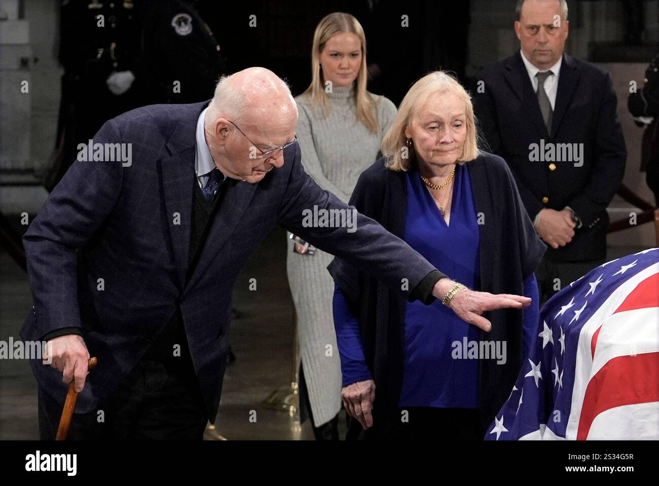 Former Sen. Patrick Leahy and his wife Marcelle pause at the flag ...