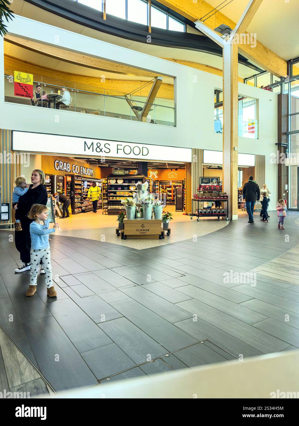 modern interior marks & spencers, M&S Food hall with families ...