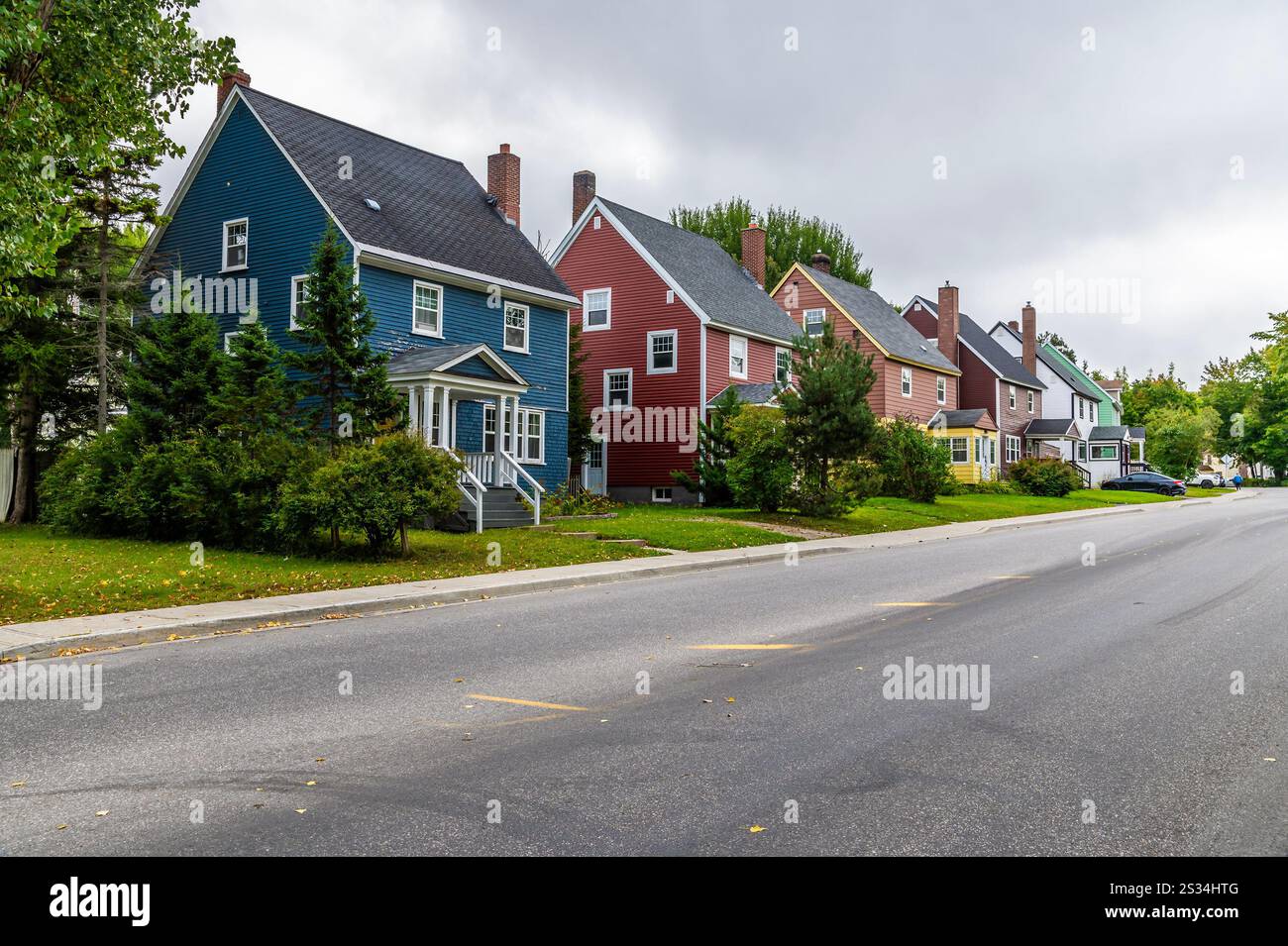 A view of colorful house in a residential street in Corner Brook in ...