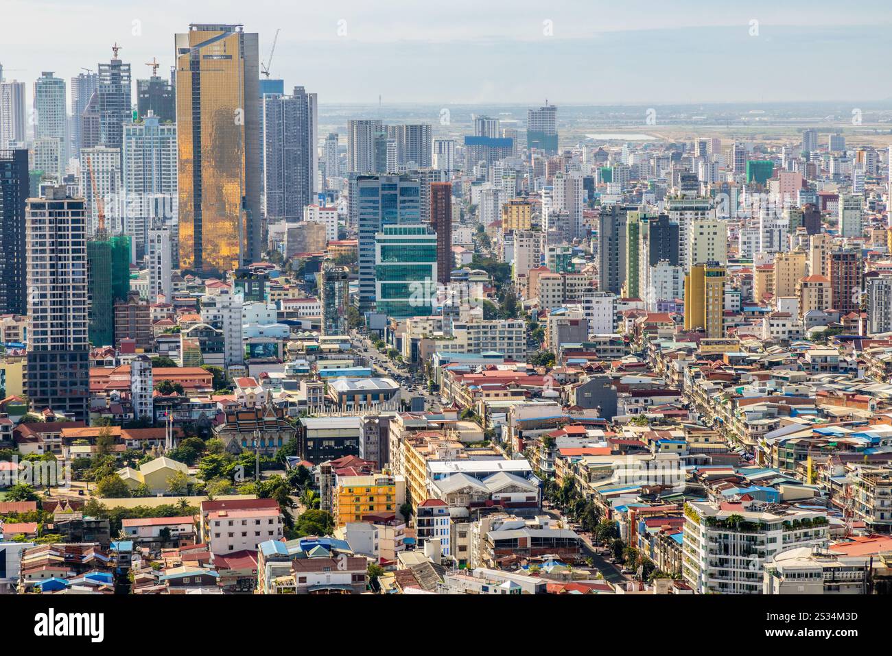 Modern office skyscrapers buildings with residential areas in rapidly developing Phnom Penh ...