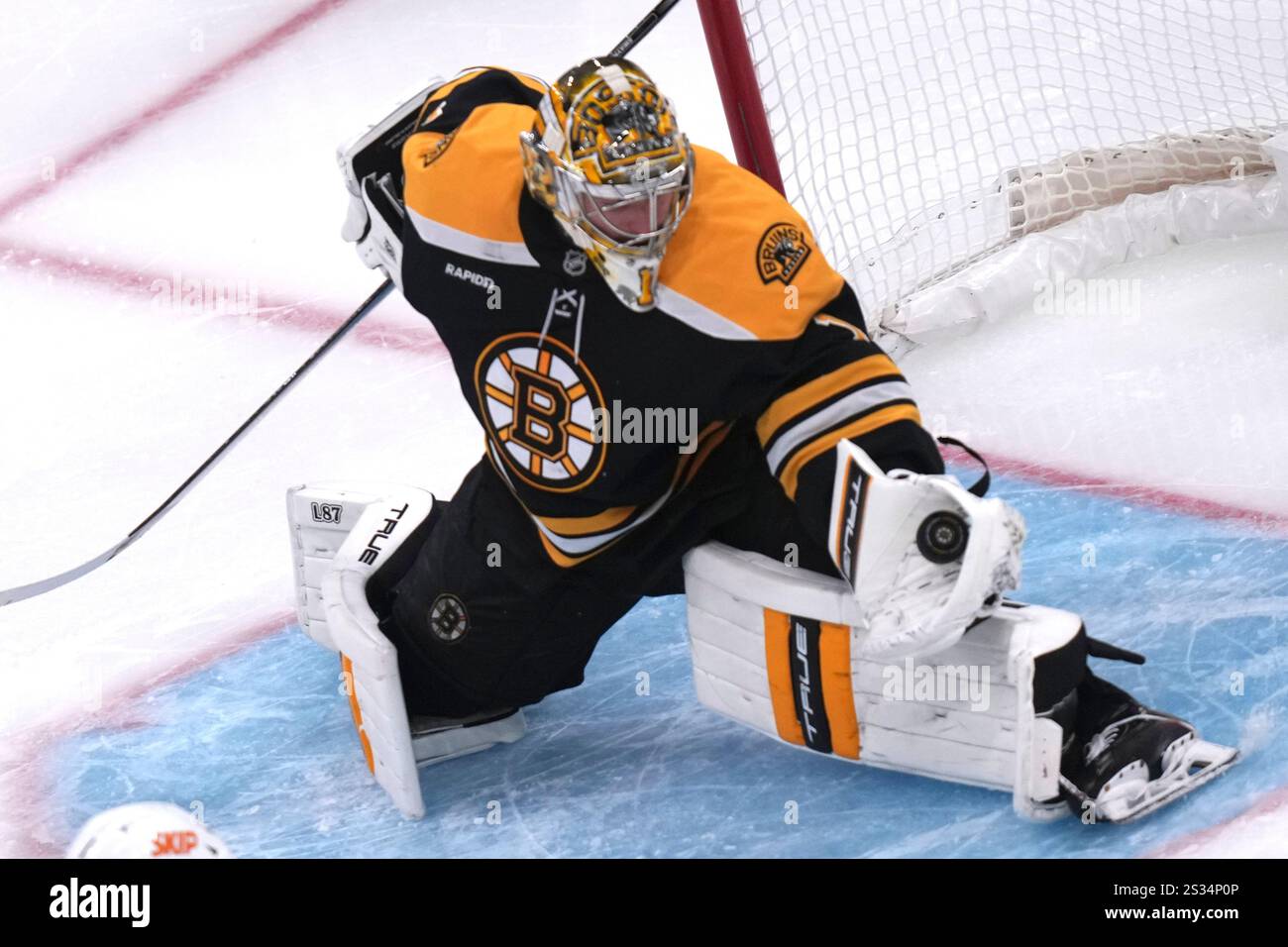 Boston Bruins goaltender Jeremy Swayman (1) makes a save during an NHL ...