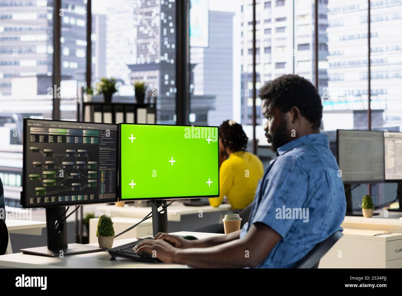 Programmer using mockup PC to develop machine learning APIs solving ... Programmer using mockup PC to develop machine learning APIs solving ...