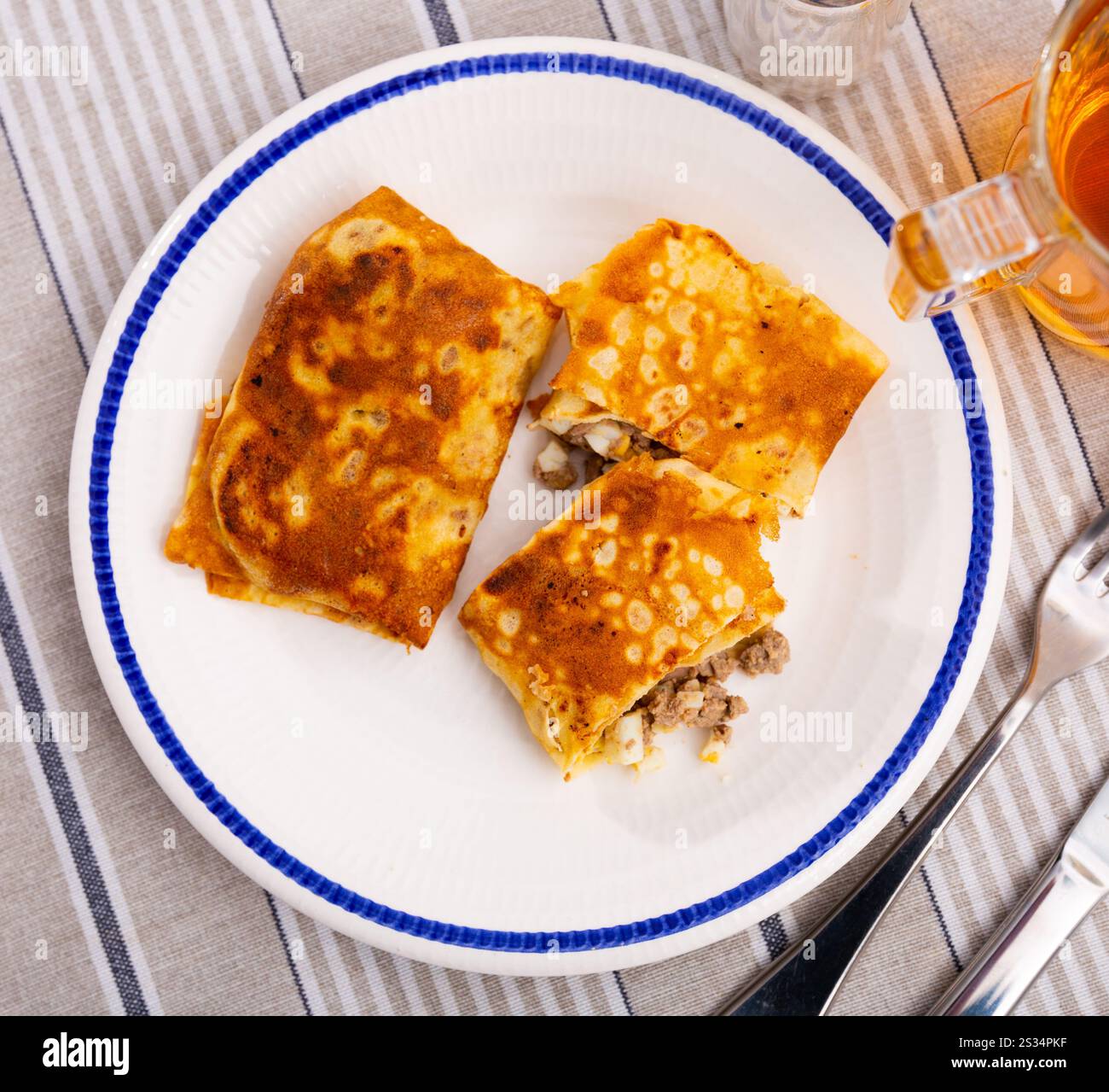 Pancakes stuffed with liver and egg Stock Photo - Alamy