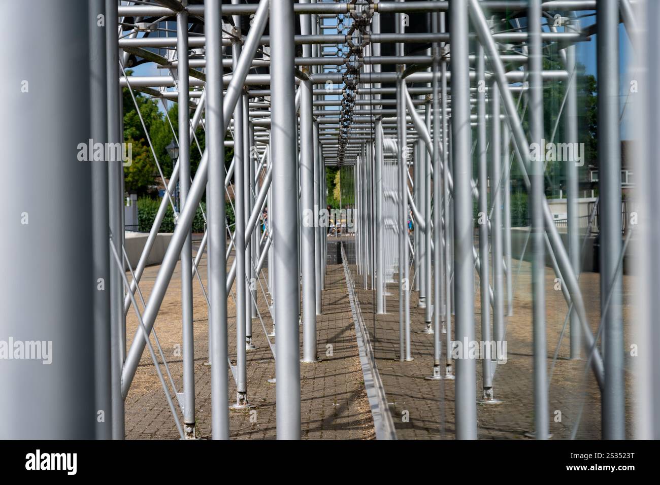 Abstract pattern in tubular support steel in street Stock Photo - Alamy