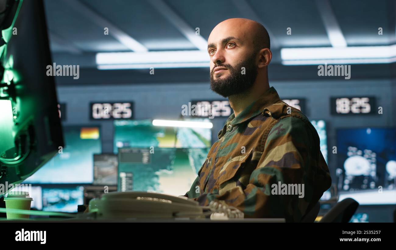 Special forces professional in military HQ base gathering information ...