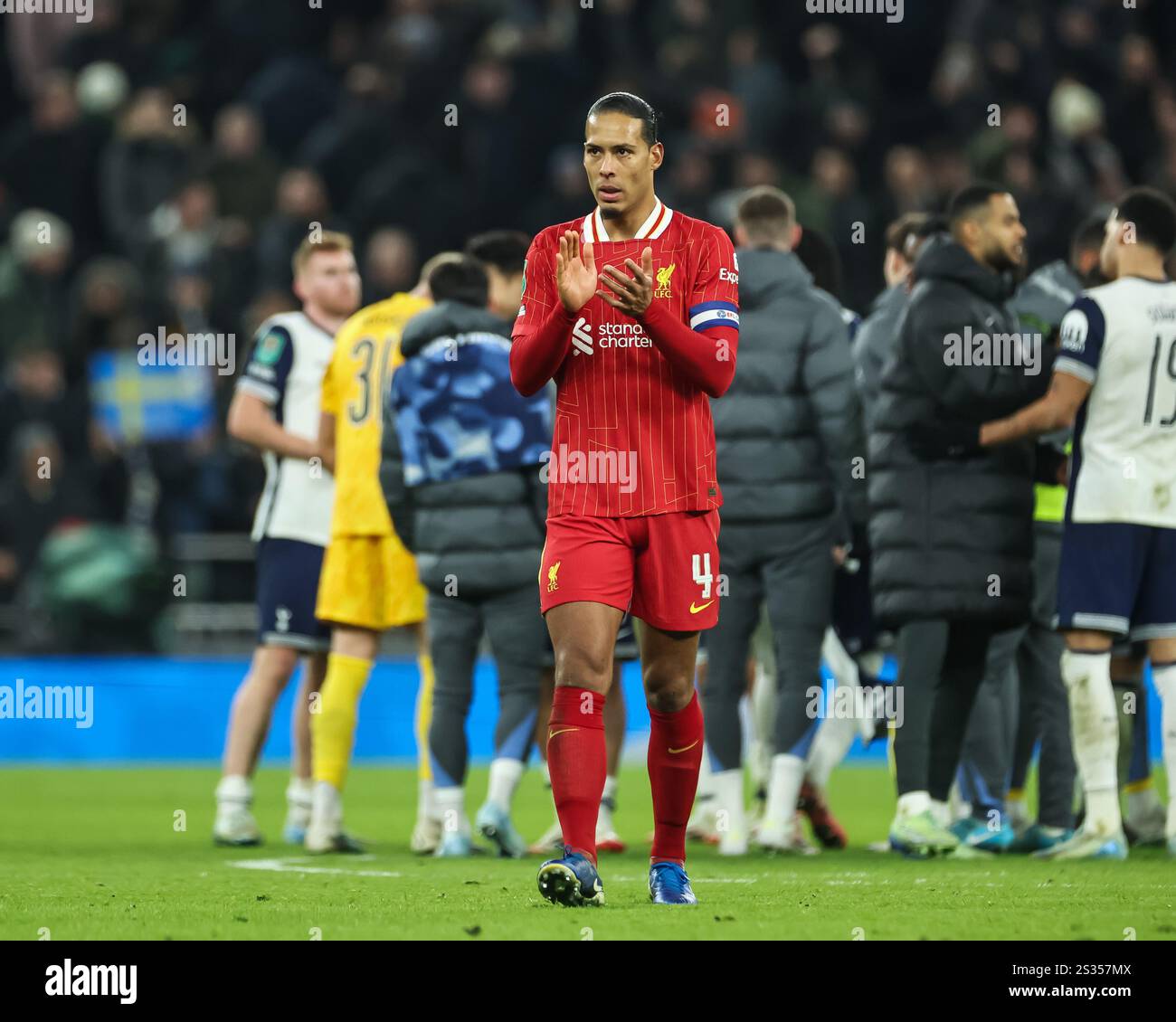 Virgil van Dijk of Liverpool applauds the fans at the end of the ...