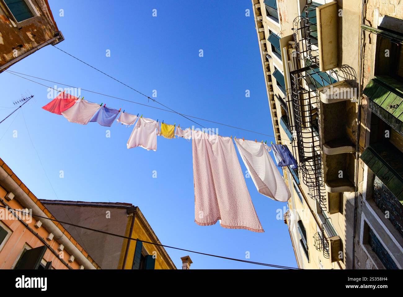 Venice, Italy - July 3, 2022: Typical city corner with ancient colorful ...
