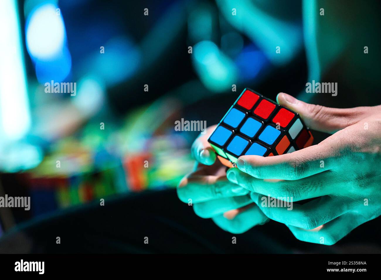January 8, 2025: Dylan Sadiq (The College Cuber) manipulates a Rubik's ...
