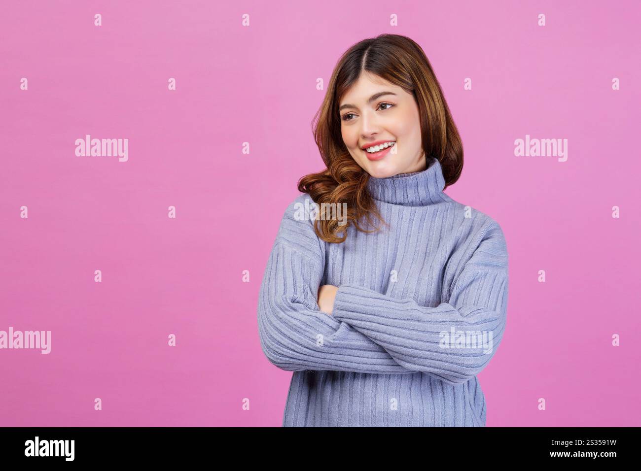 Portrait of Happy young woman cross arm isolated over pink background ...