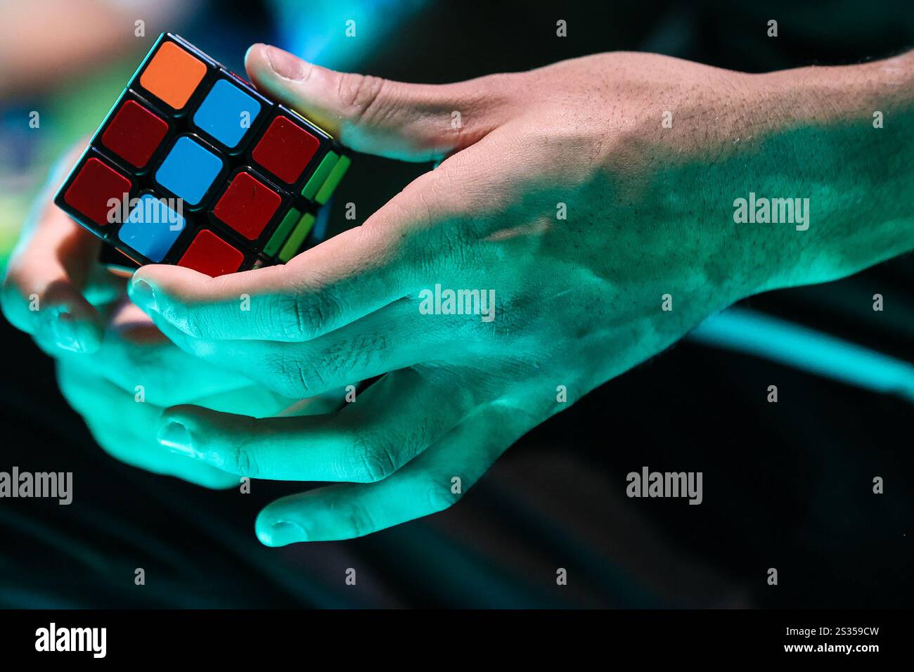 January 8, 2025: Dylan Sadiq (The College Cuber) manipulates a Rubikâ ...