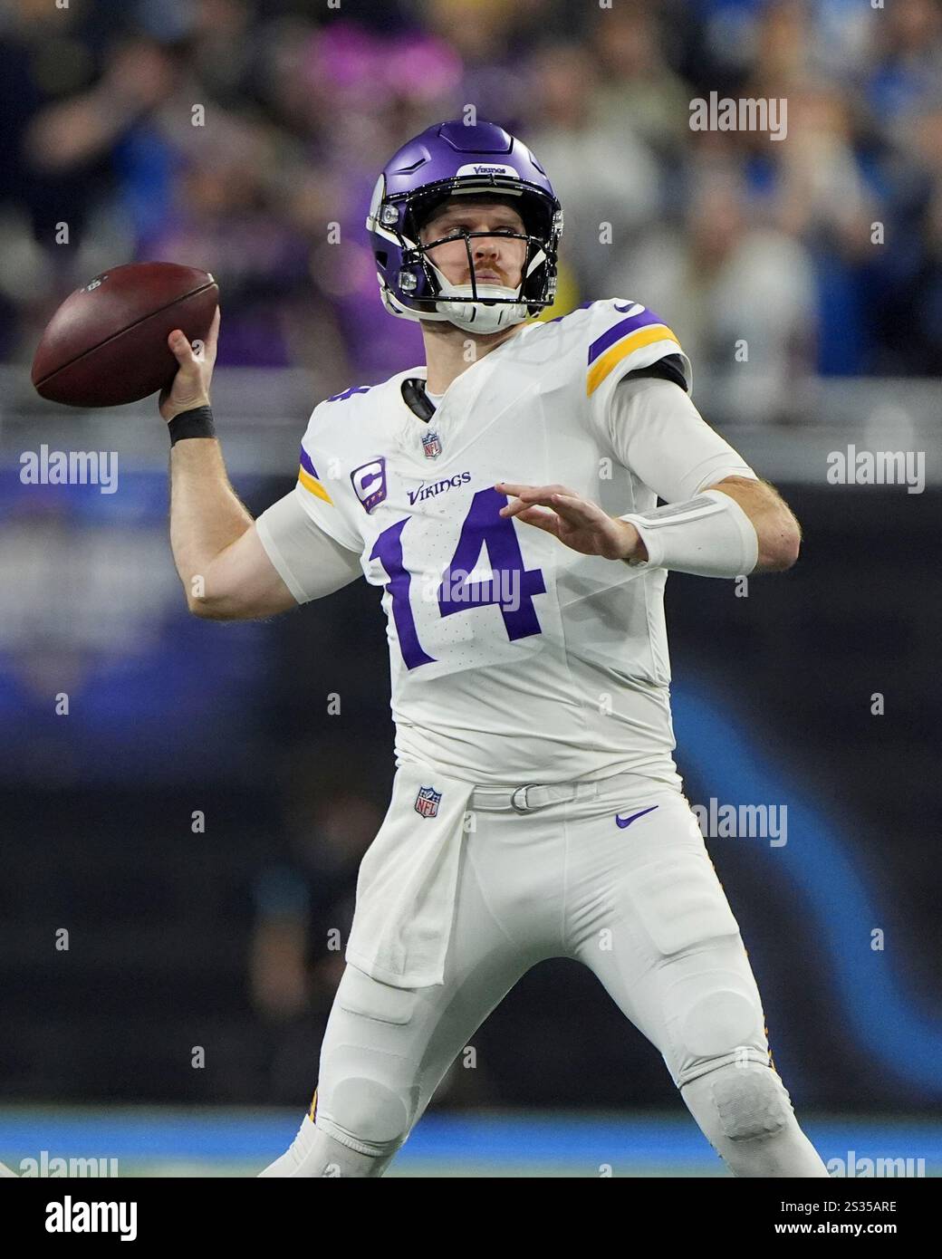Minnesota Vikings quarterback Sam Darnold looks to pass during the ...