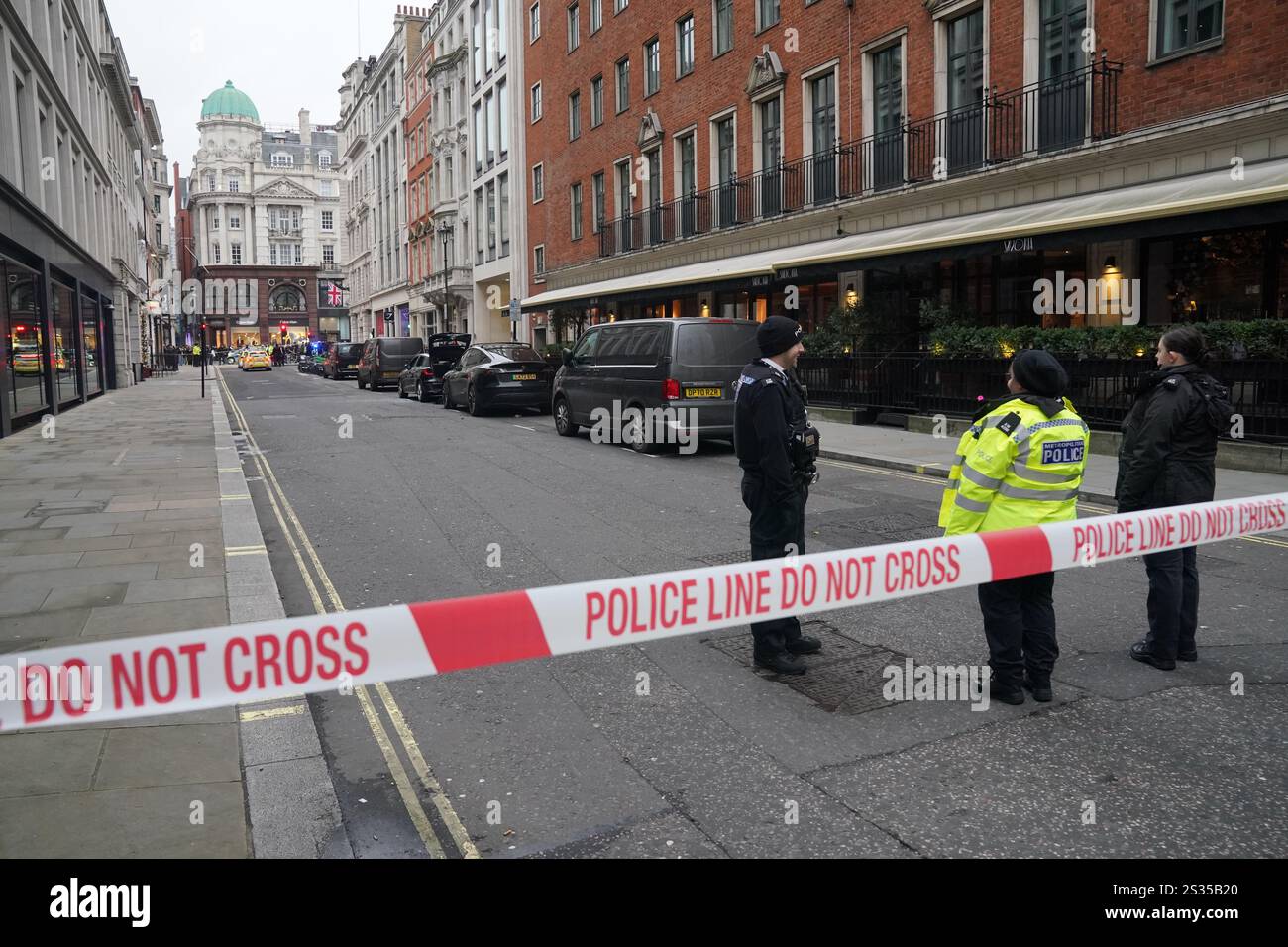 Police set up a cordon as they investigate a suspicious vehicle in ...