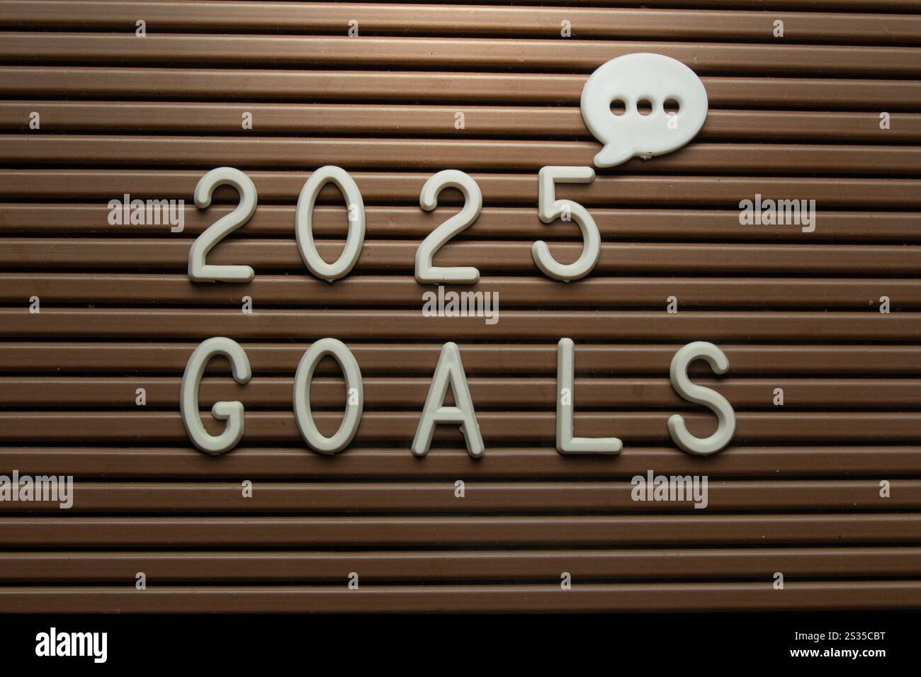 2025 goal text on letter board with brown background, New Year 2025 ...