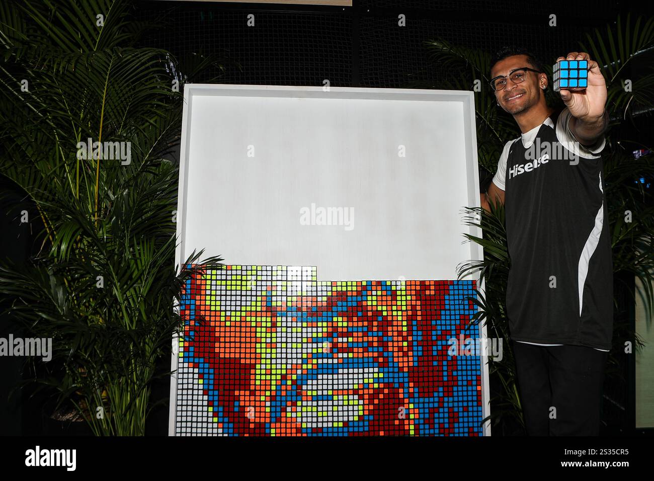 January 8, 2025: Dylan Sadiq (The College Cuber) creates a portrait of ...